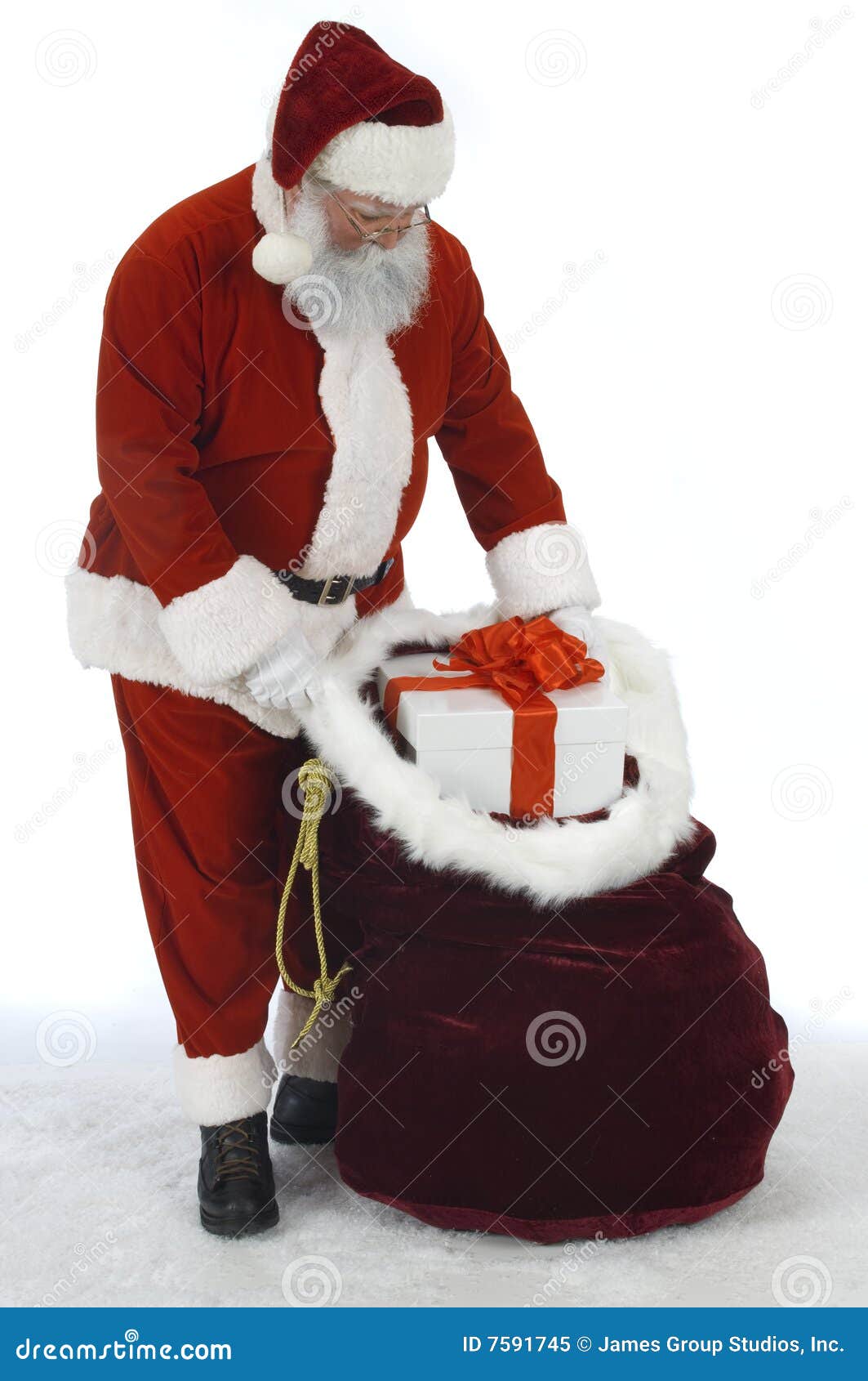 Santa Opening Sack of Toys stock image. Image of holiday - 7591745