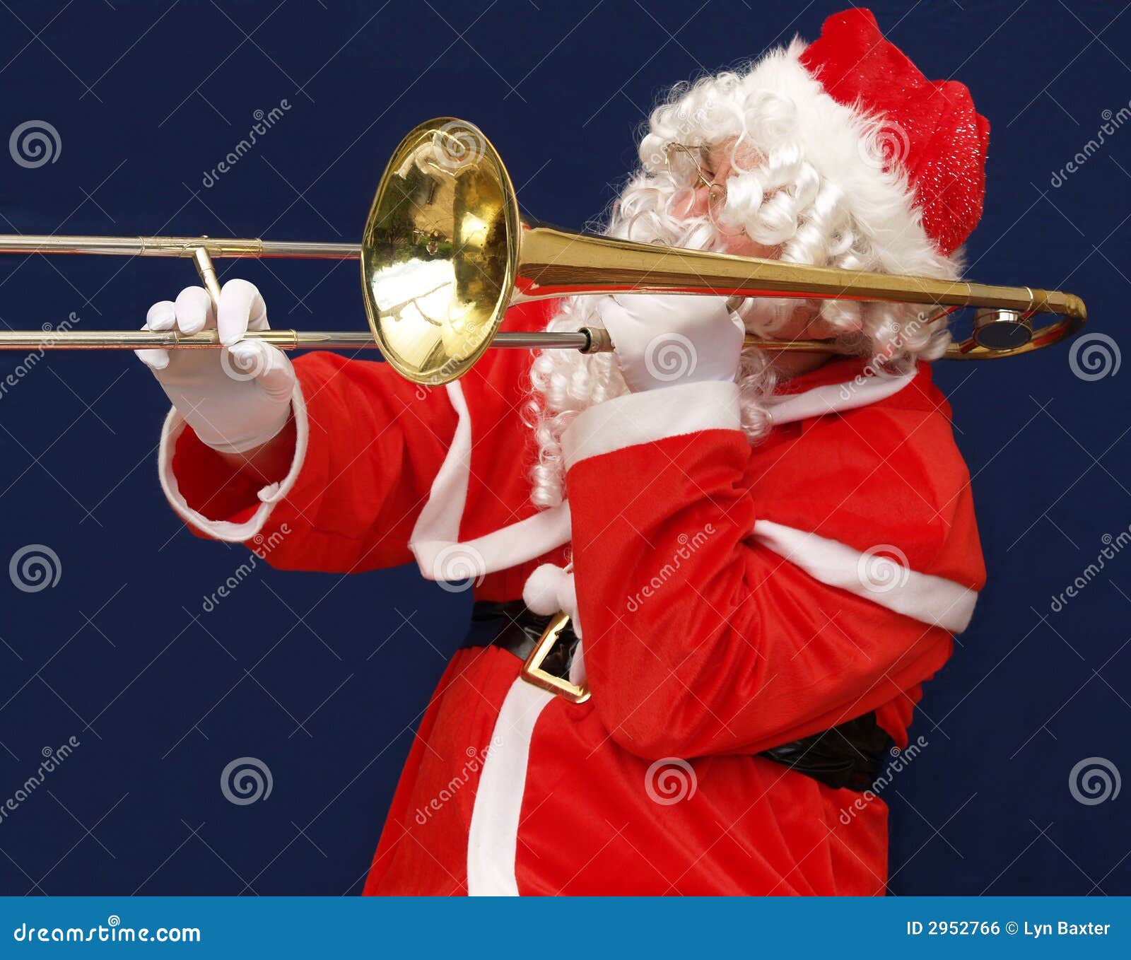 Santa playing the trombone stock photo. Image of tradition - 2952766