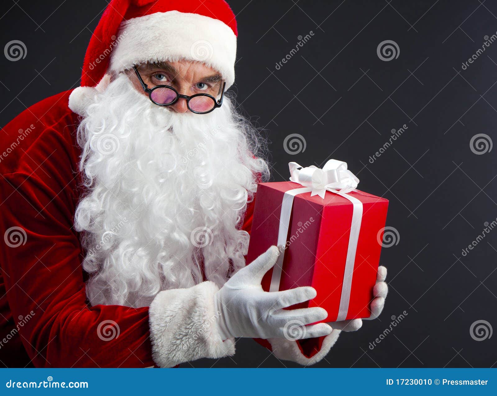 Santa with present stock photo. Image of portrait, black - 17230010