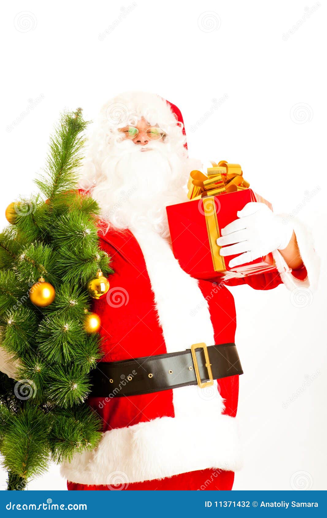 Santa with Present and Christmas Tree Stock Photo - Image of gift ...
