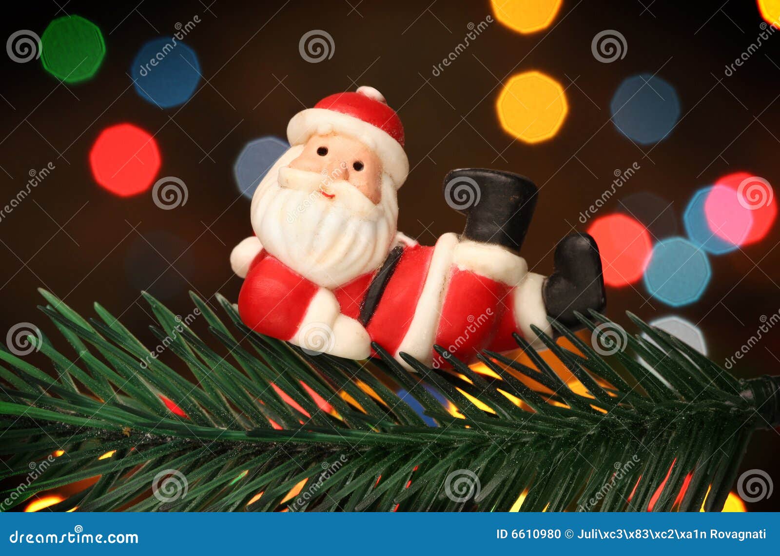 Santa Resting Over a Christmas Branch Tree Stock Photo - Image of ...