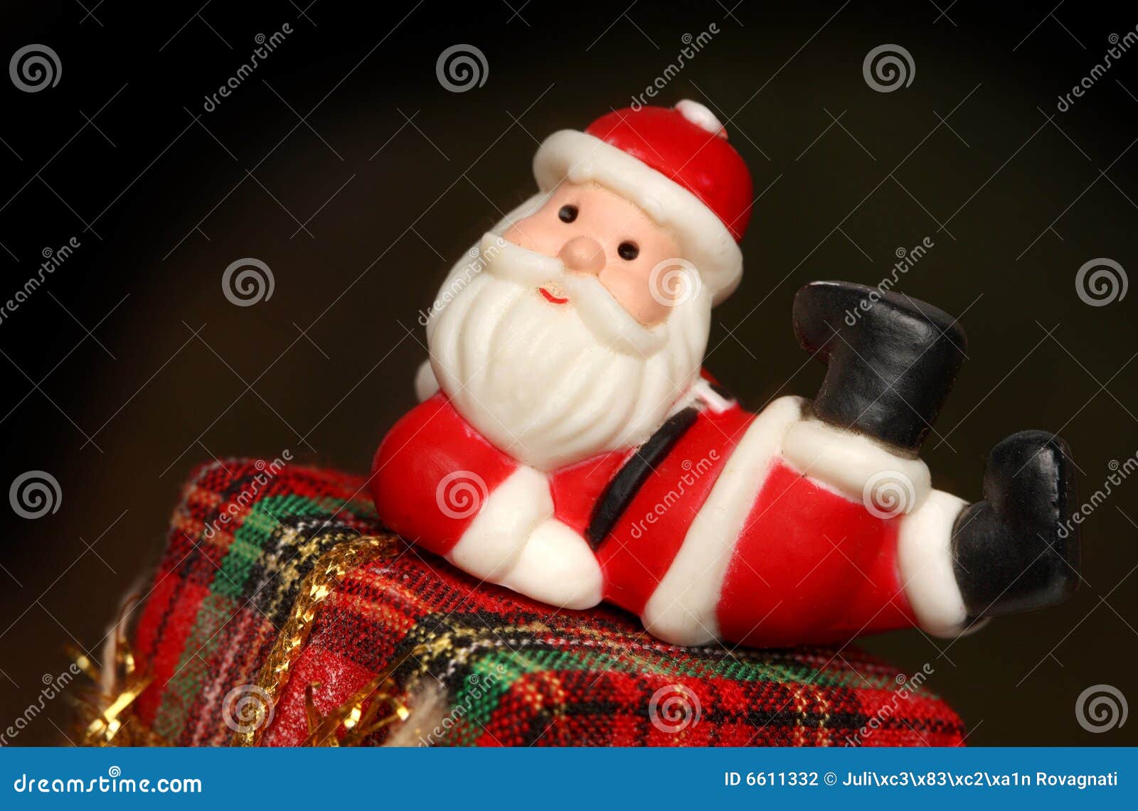 Santa Resting Over a Gift Box Stock Photo - Image of celebration ...