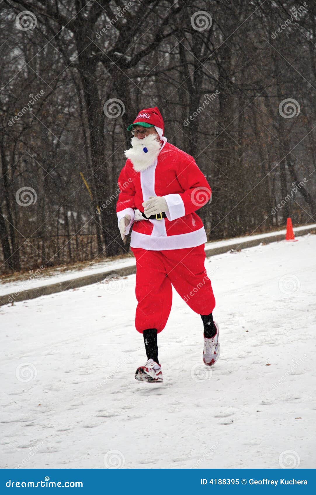 Santa Running in the Snow editorial image. Image of athlete - 4188395