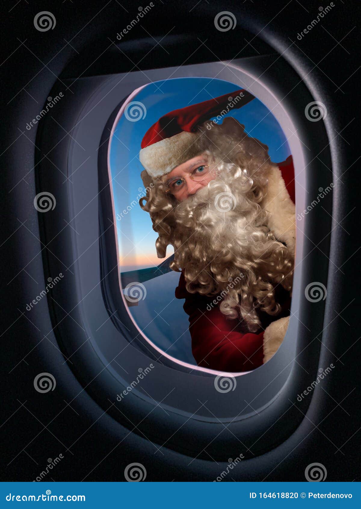 Santa Glancing from Airplane Window Stock Photo - Image of northpole ...