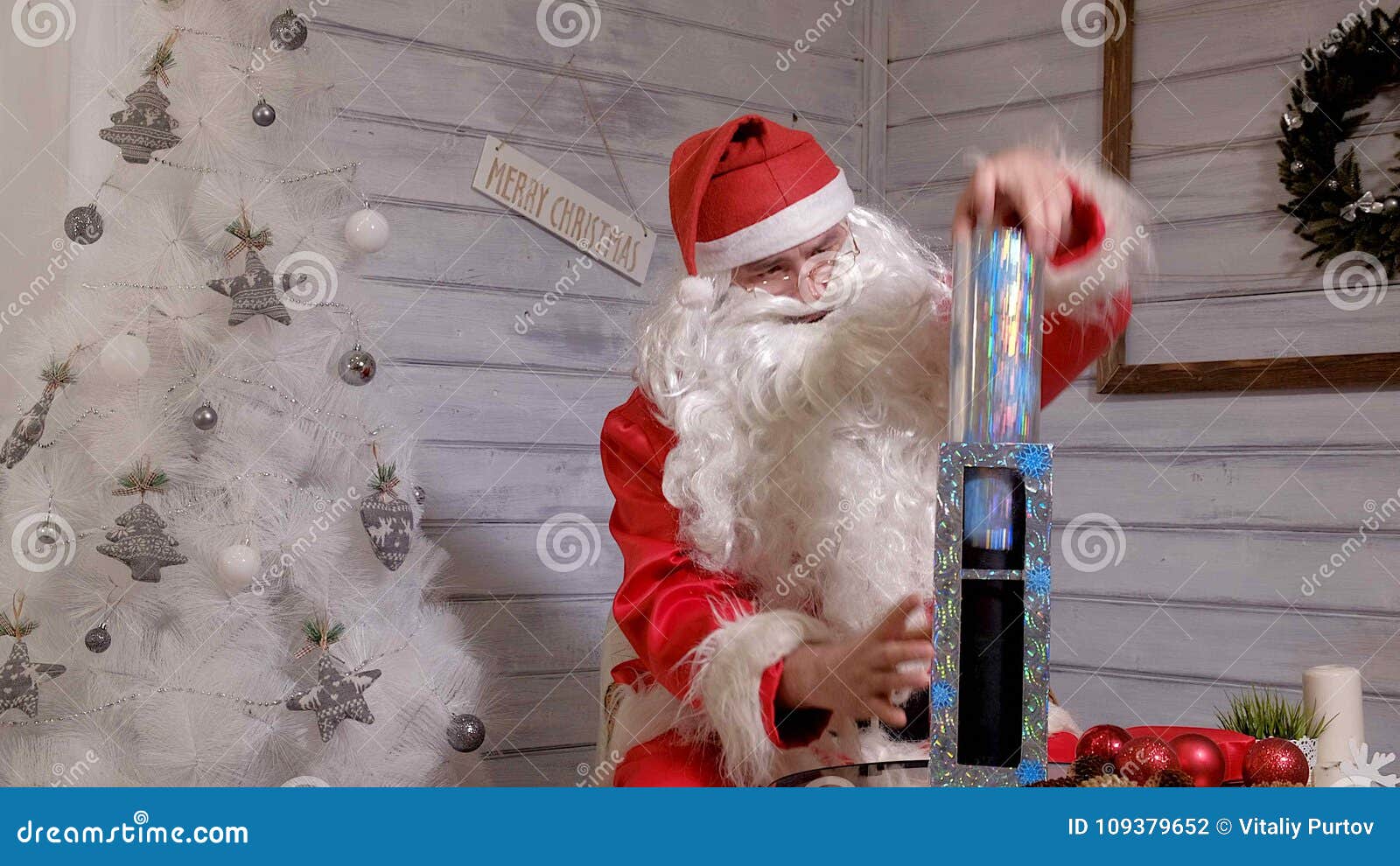 Santa Shows Trick with a Pipe Stock Photo - Image of cheerful, party ...