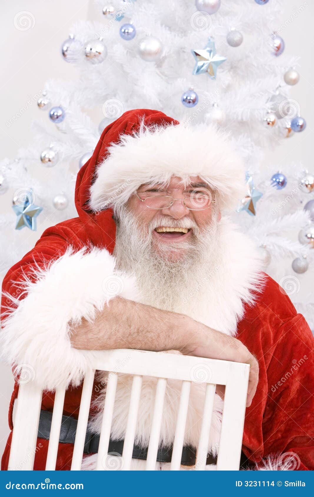 Santa sitting on a chair stock photo. Image of winter - 3231114