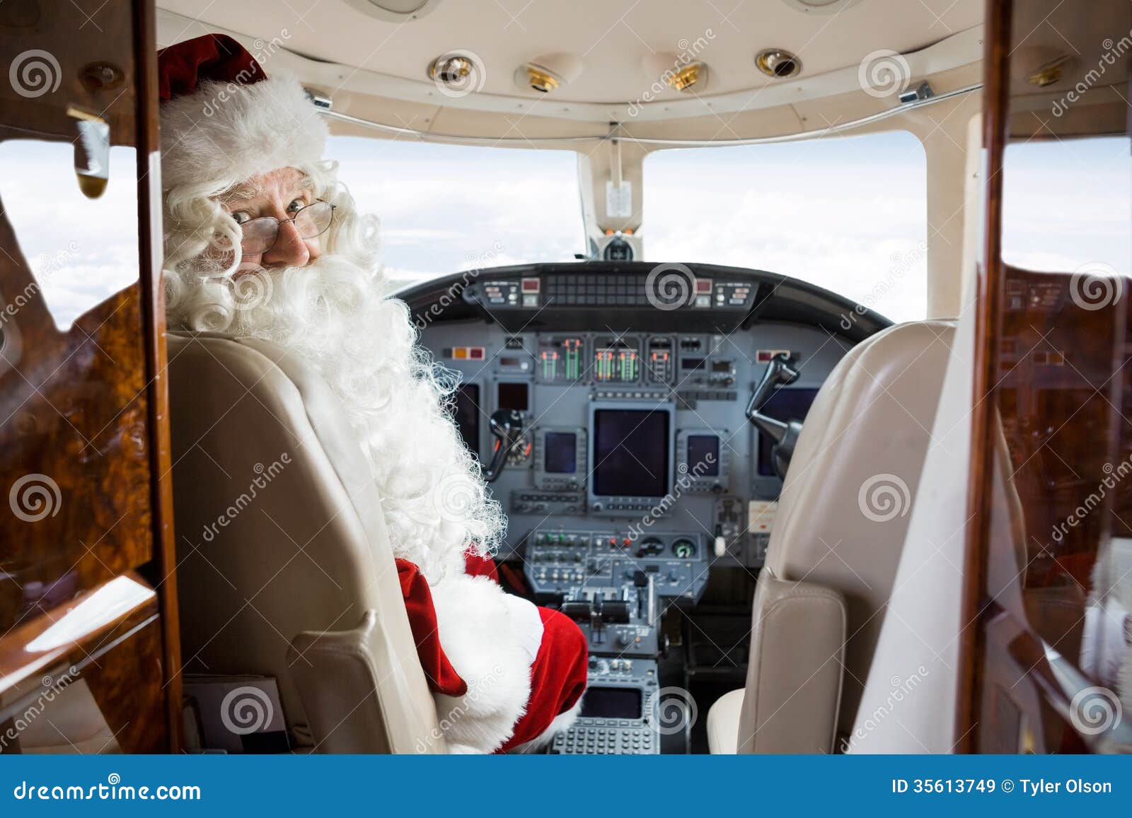 Santa Sitting in Cockpit of Private Jet Stock Image - Image of portrait ...