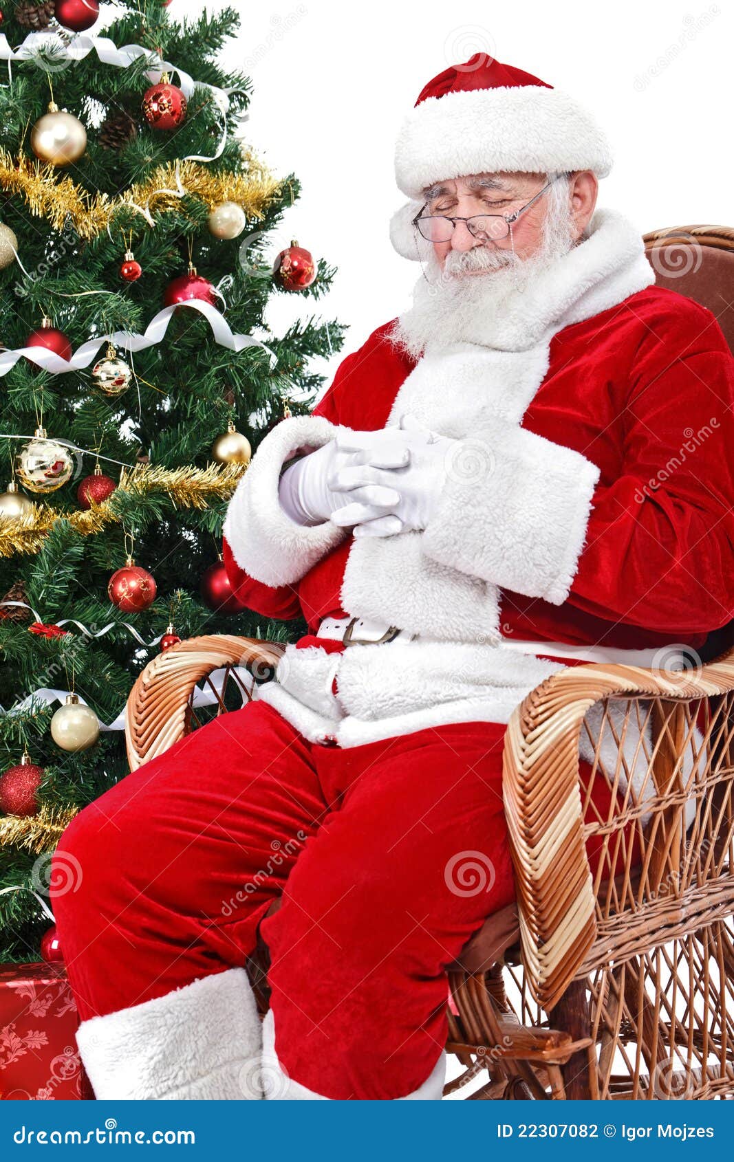 Santa sleeping in his char stock photo. Image of male - 22307082