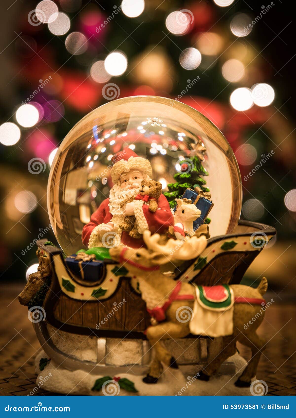 Santa Snow Globe stock image. Image of bokeh, figurine - 63973581