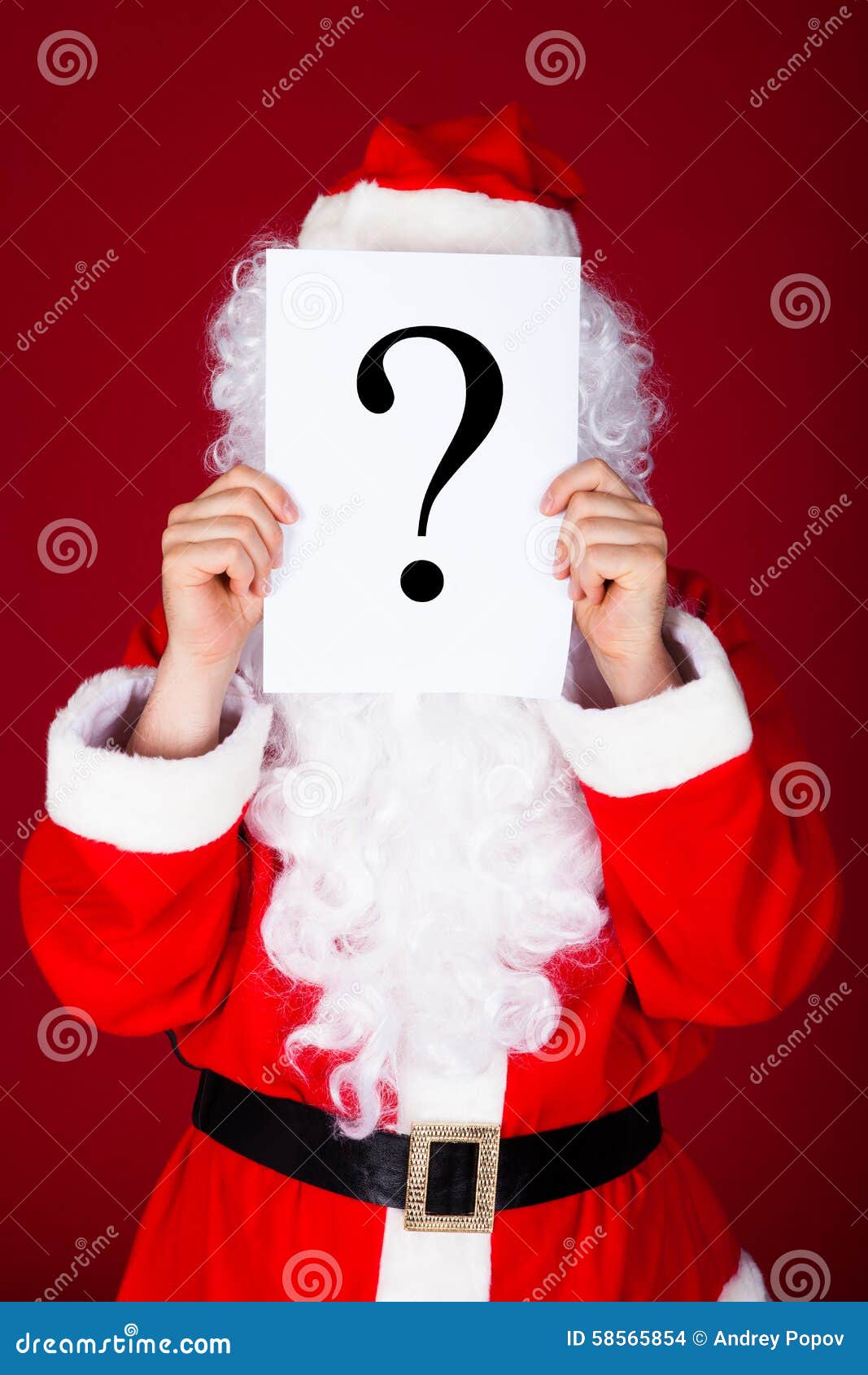 Santa Tenant Le Point D'interrogation Devant Son Visage Photo stock ...