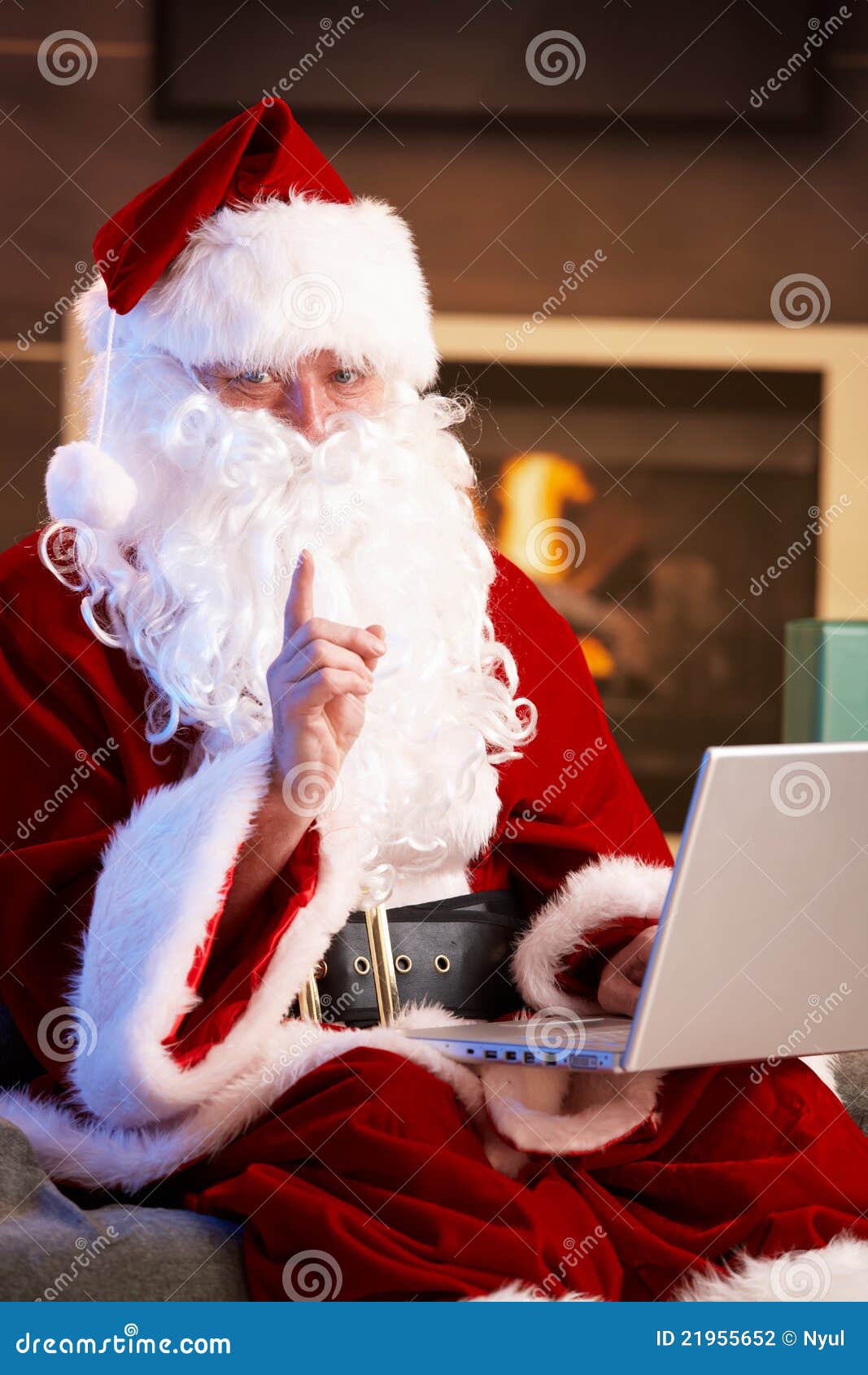 Santa using computer stock photo. Image of good, december - 21955652