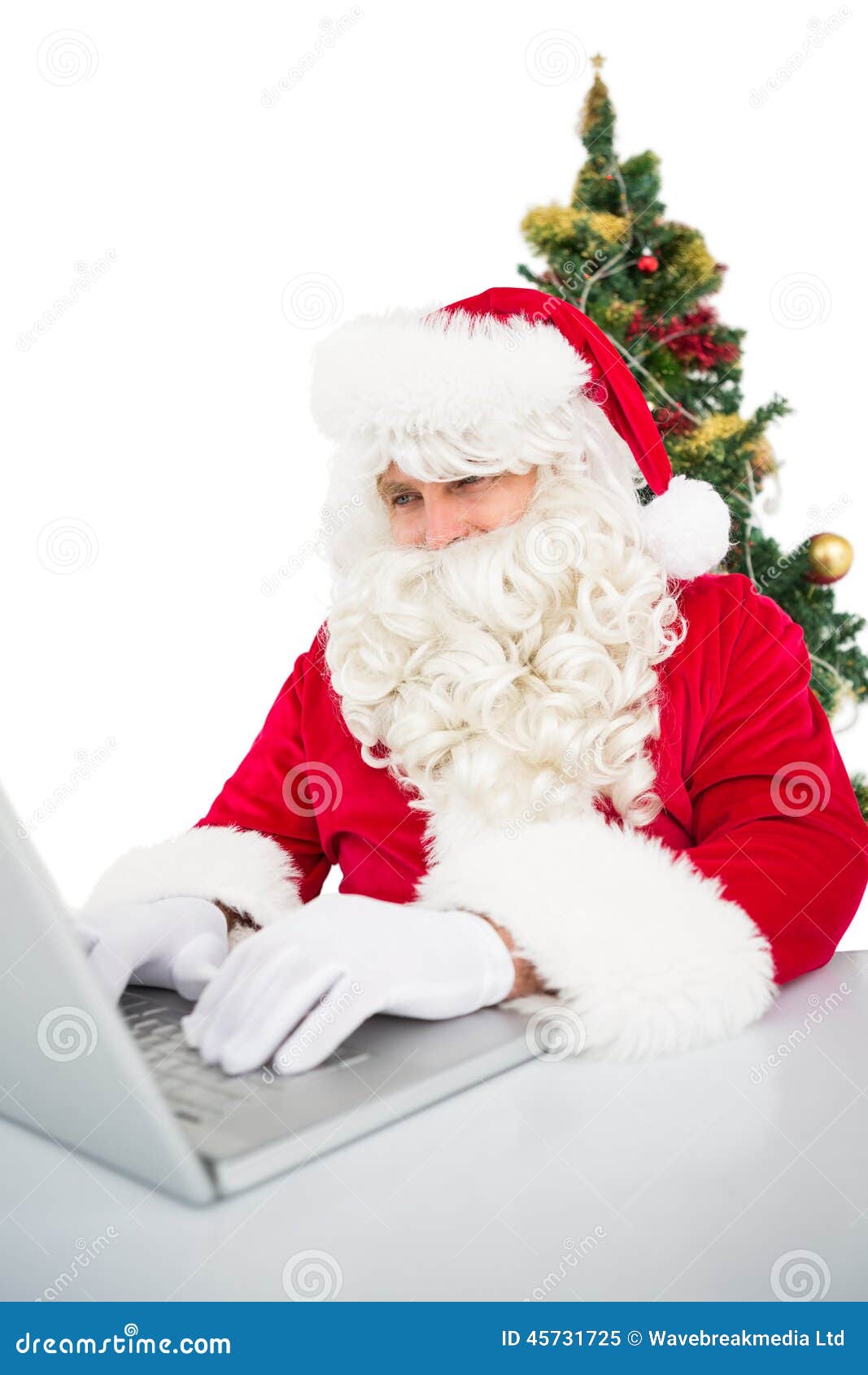 Santa Using His Laptop Near Christmas Tree Stock Image - Image of ...