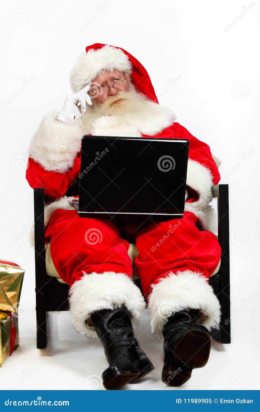 Santa using laptop stock image. Image of holiday, sitting - 11989905