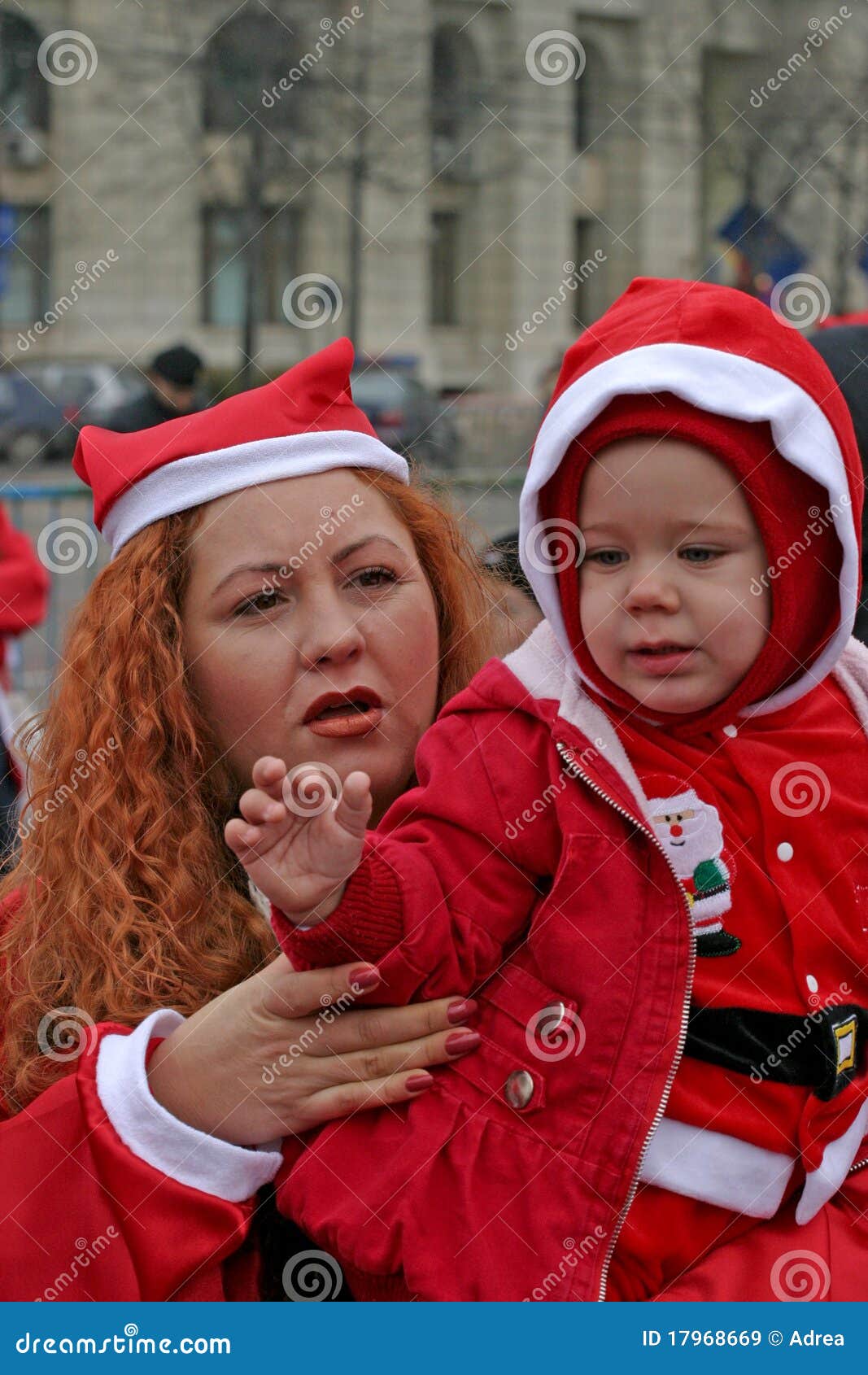 Mother and Baby Dressed Like Santa Claus Editorial Stock Image - Image ...