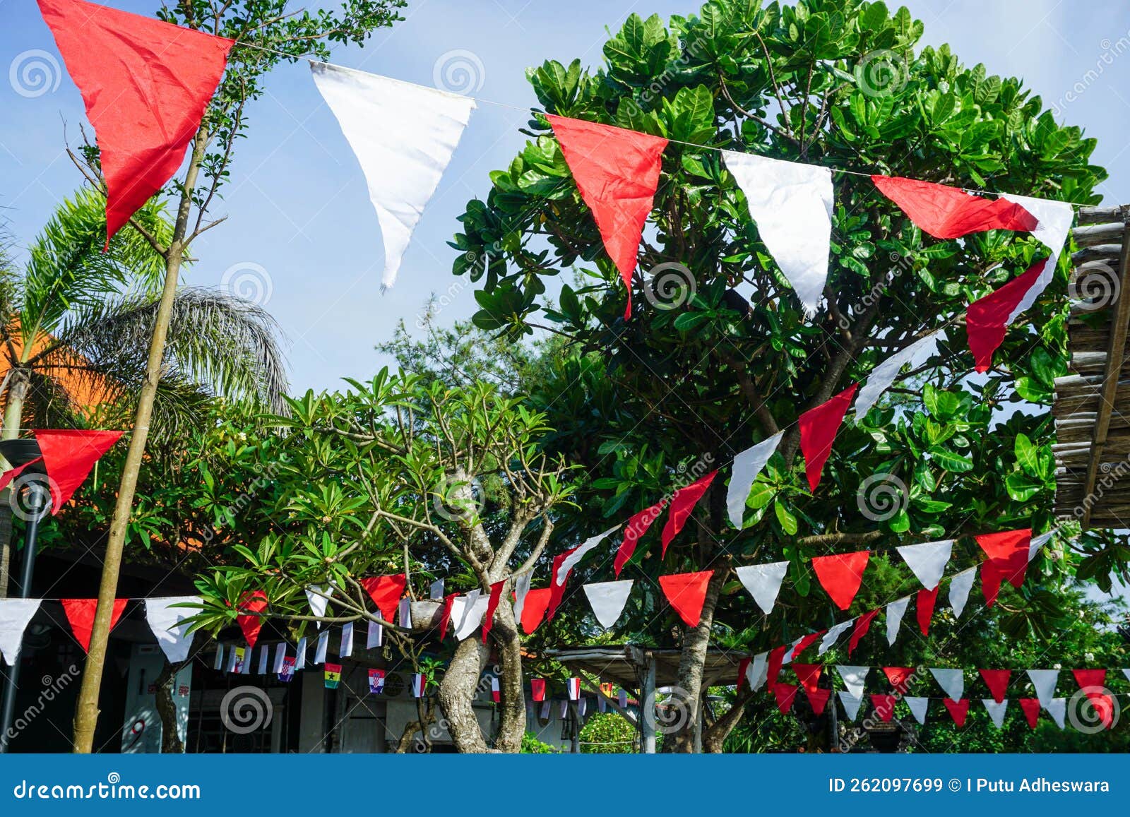 A Row of Triangular Flags on the Beach Stock Image - Image of plank ...