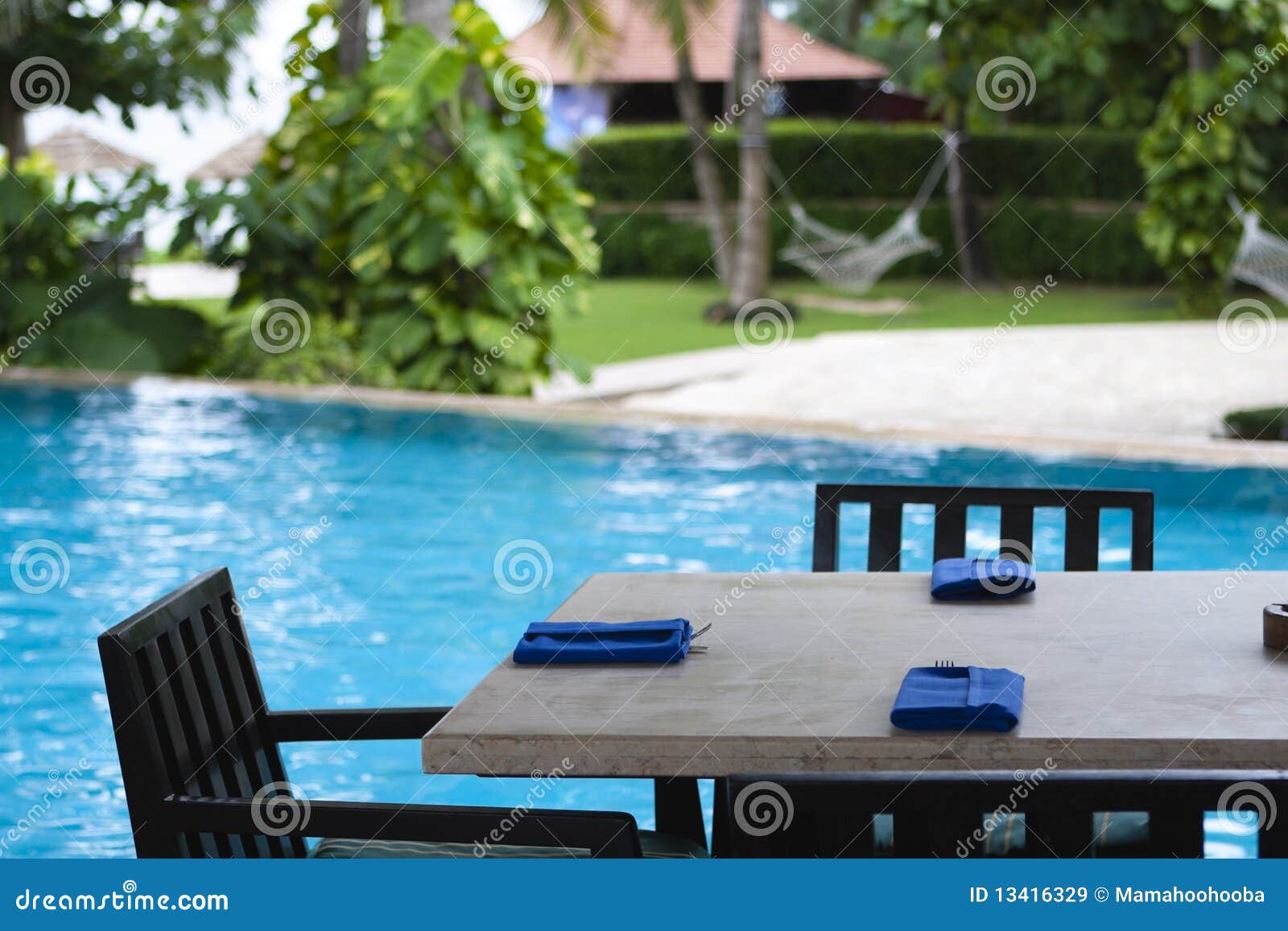 Sanya: Poolside Dining Table Royalty-Free Stock Photography ...