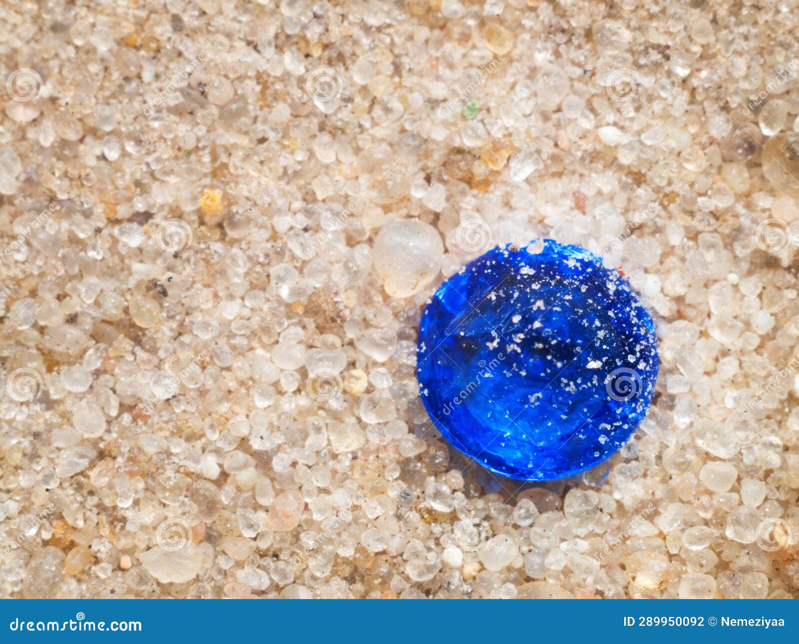 Sapphire Crystal in the Sand Stock Photo - Image of jewels, sapphire ...