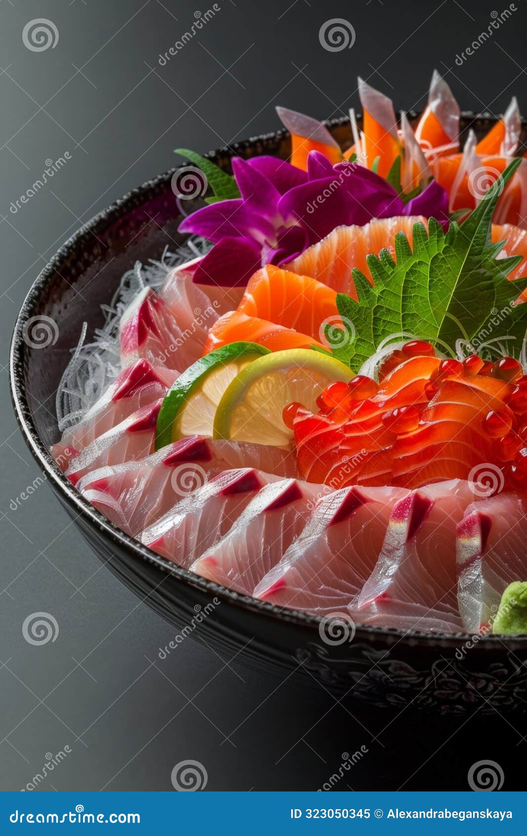 Sashimi. Assorted Sashimi with Various Types of Fish, Lemon Slices, and ...