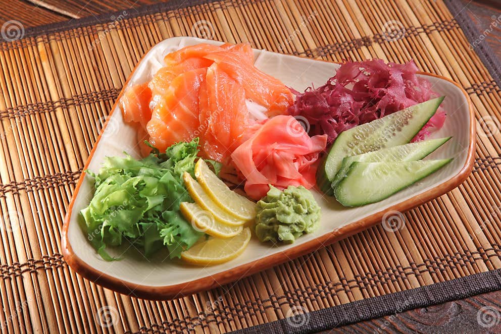 The Sashimi with Seaweed and Lemon Stock Photo - Image of diet, lunch ...