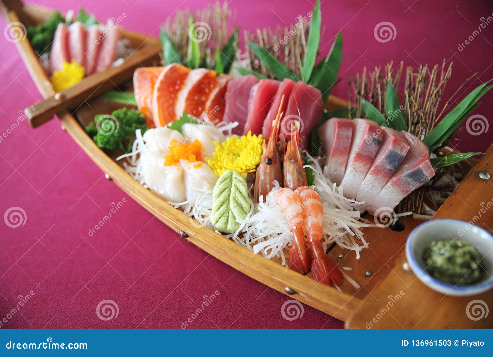 Sashimi set on wooden boat stock image. Image of seafood - 136961503