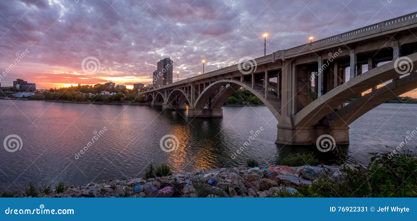 Saskatoon skyline at night stock image. Image of water - 76922331