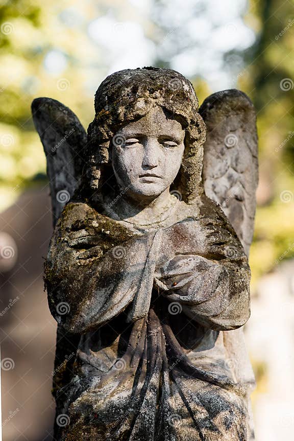 A sat old angel stock image. Image of archangel, crucifix - 33704377