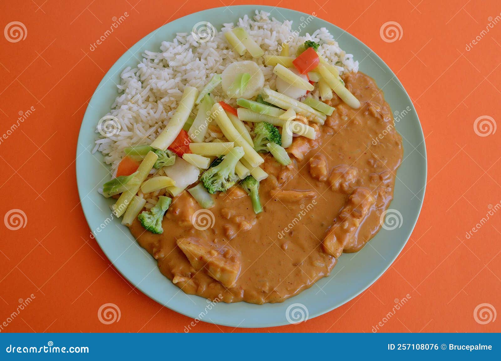 Satay Chicken with Vegetables and Rice Stock Photo - Image of person ...