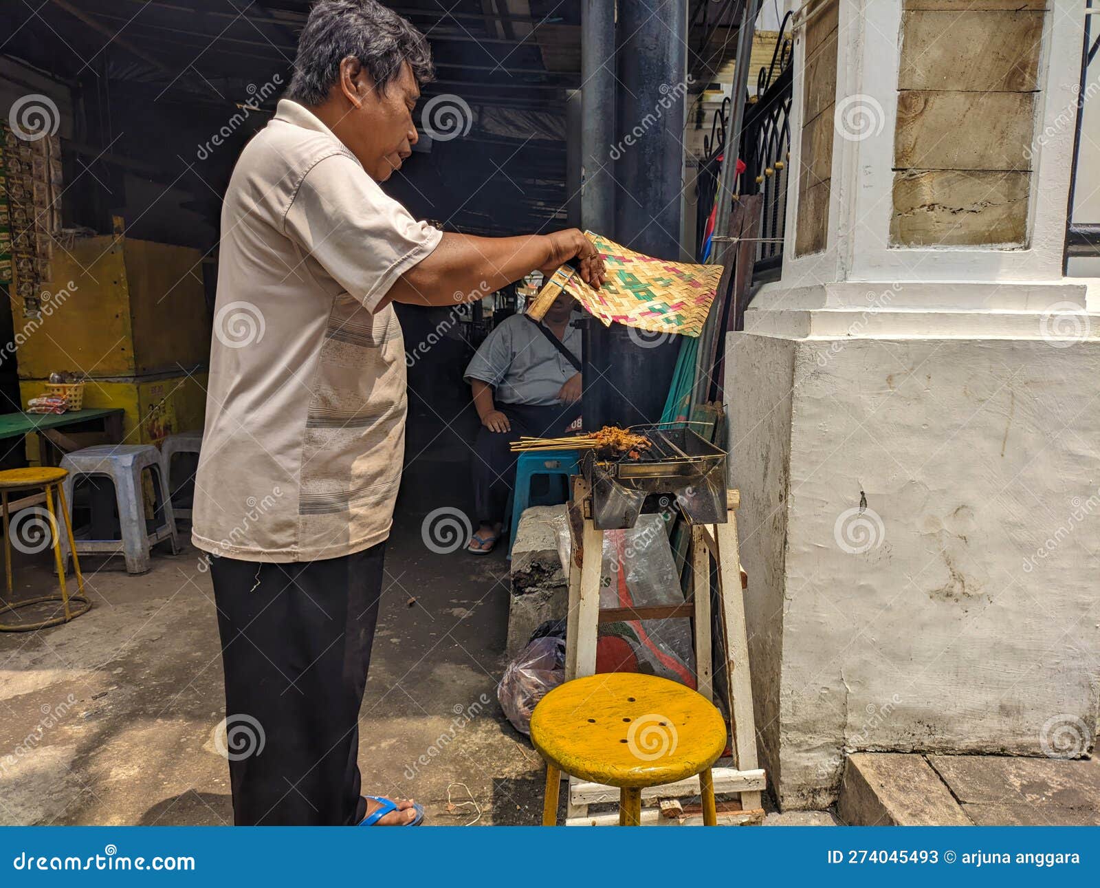 A Satay Seller Roasting Satay or Sate Over a Fire Editorial Stock Photo ...