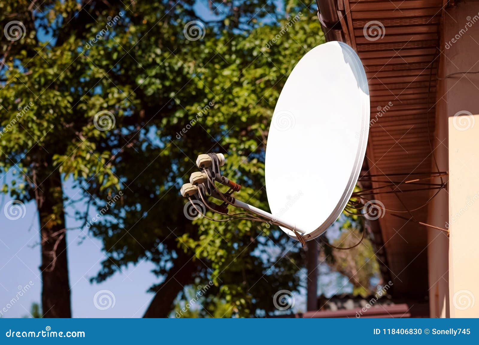 Installed Dish Or DTH Or Direct To Home Tv On The Roof Against Blur ...