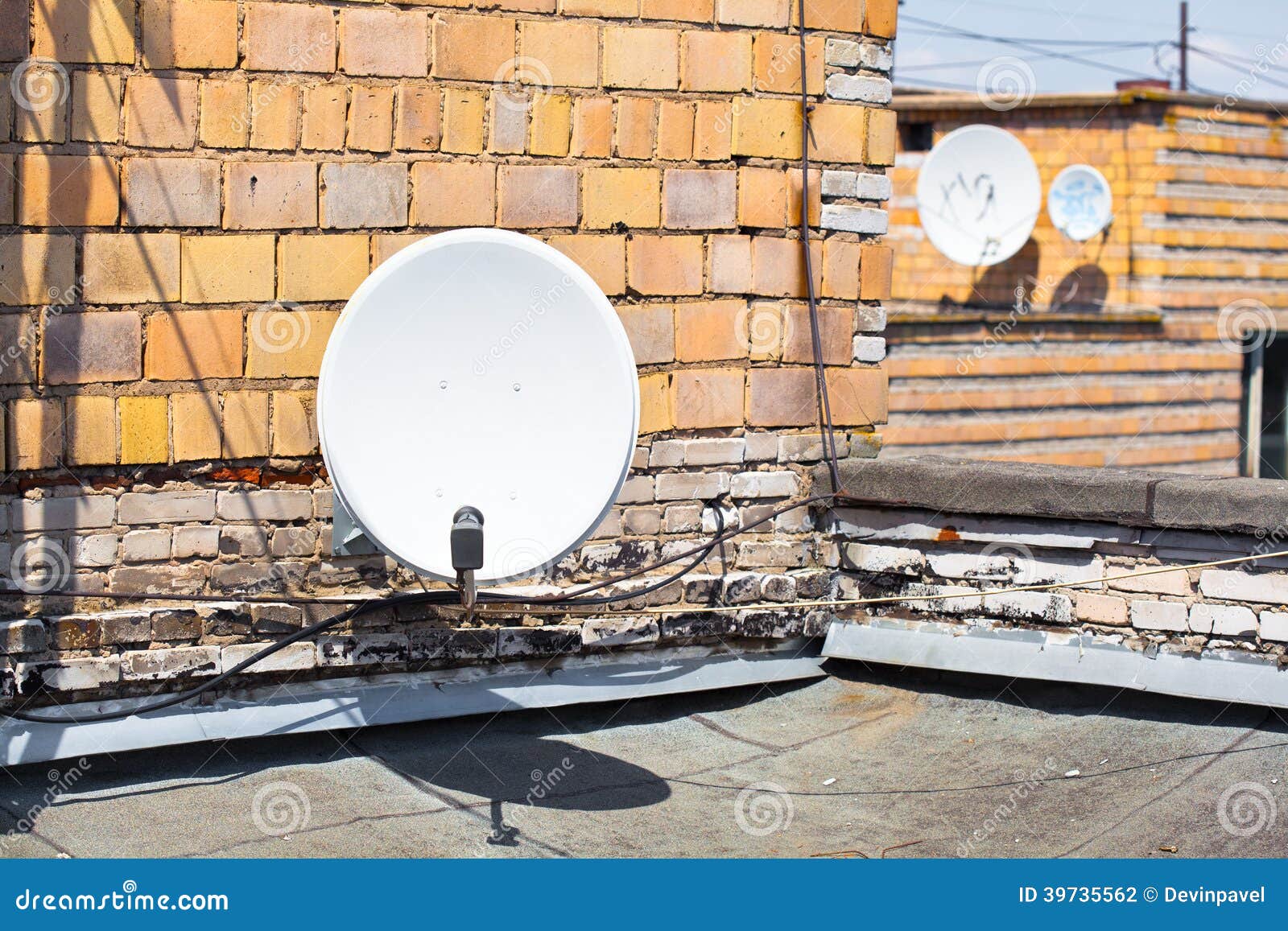 Satellite Dish on the Roof of the Building Stock Photo - Image of brick ...