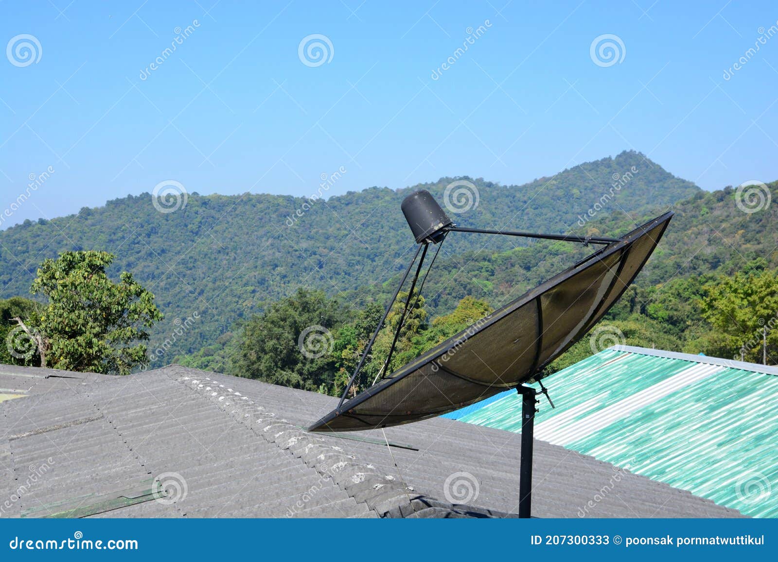 Satellite dish on the roof stock image. Image of media - 207300333