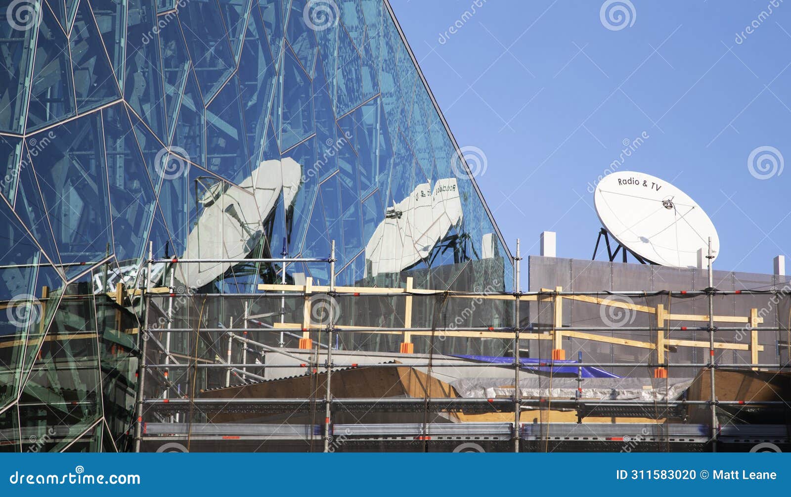 Satellite Dish with Window Reflection at City Television Building Stock ...