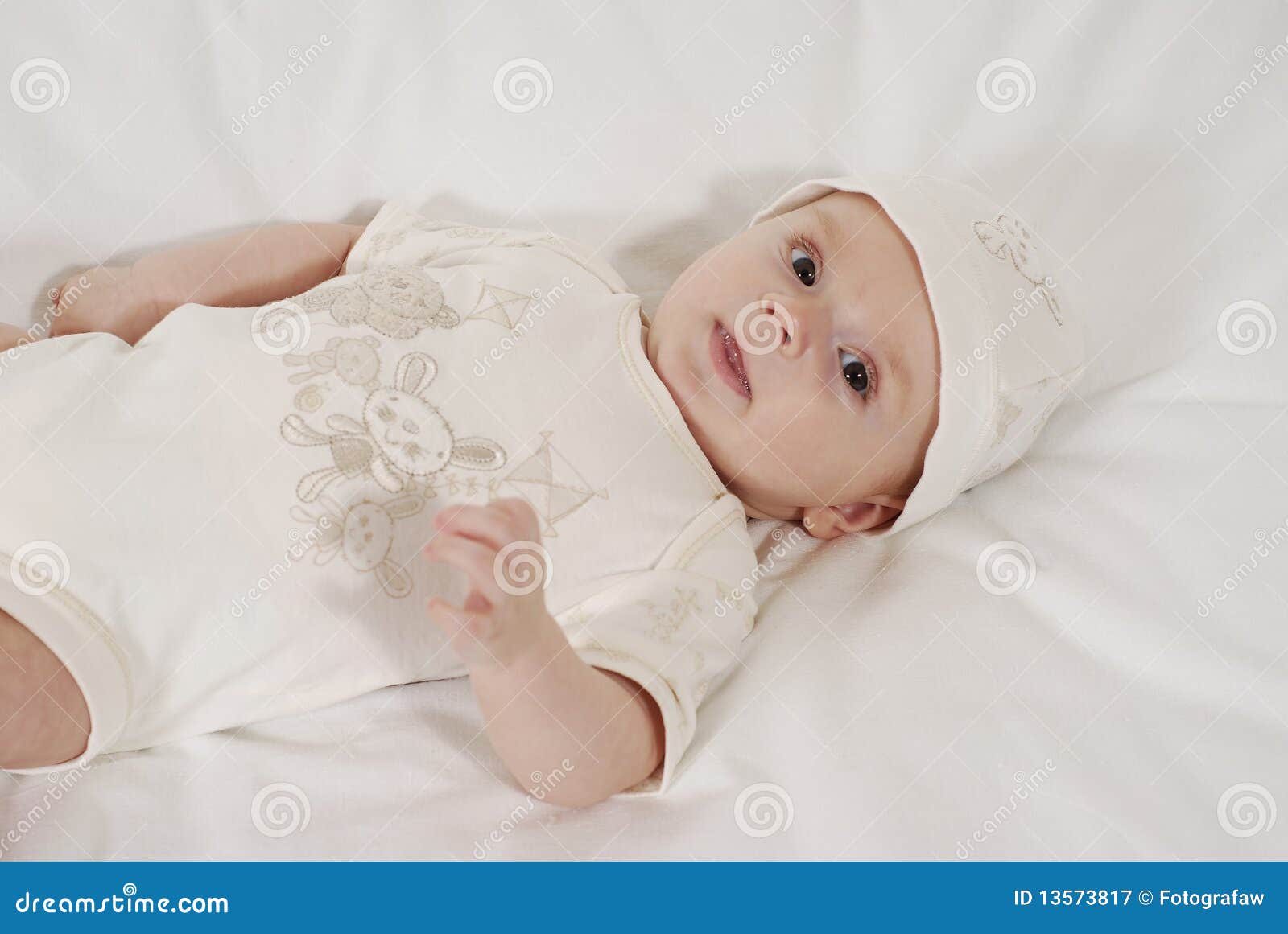 Satisfied baby stock image. Image of surprise, looks - 13573817