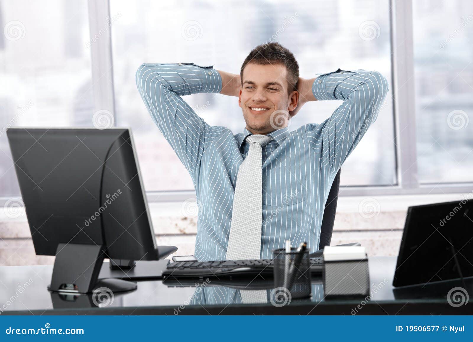 Satisfied Businessman Smiling at Desk Stock Image - Image of business ...
