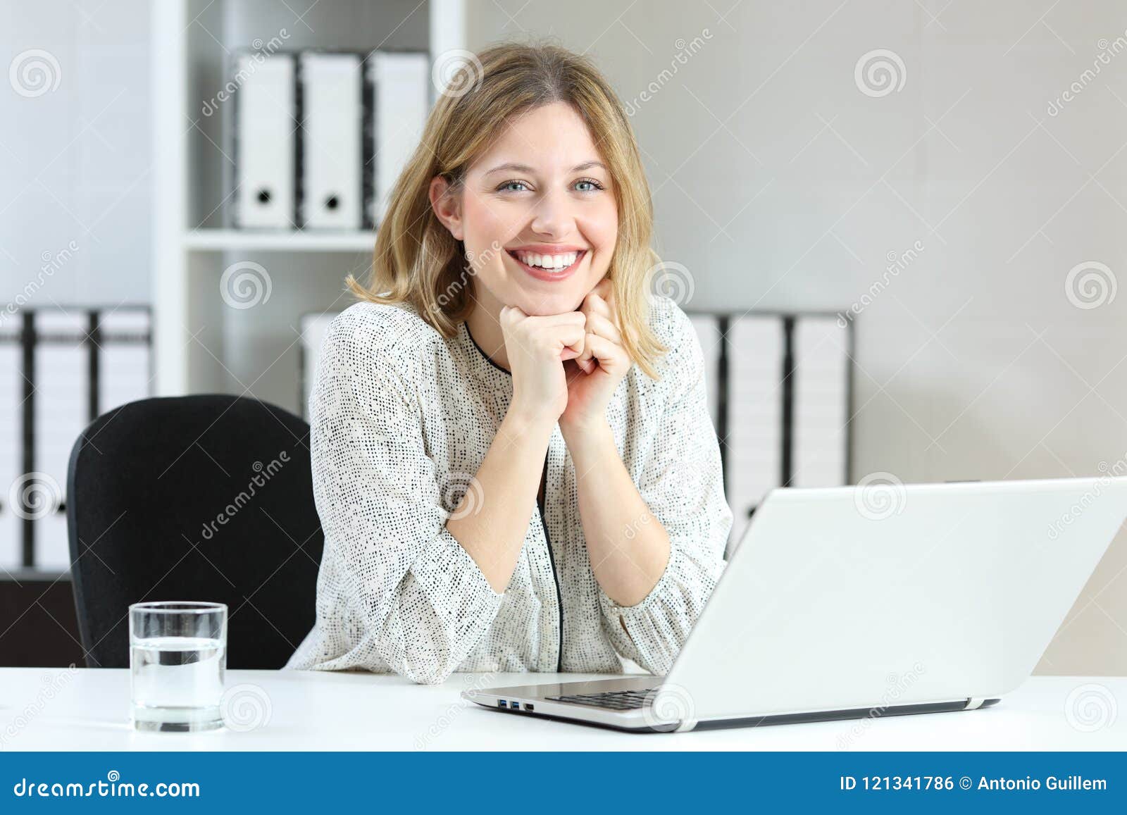 Satisfied Employee Looking at Camera at Office Stock Photo - Image of ...