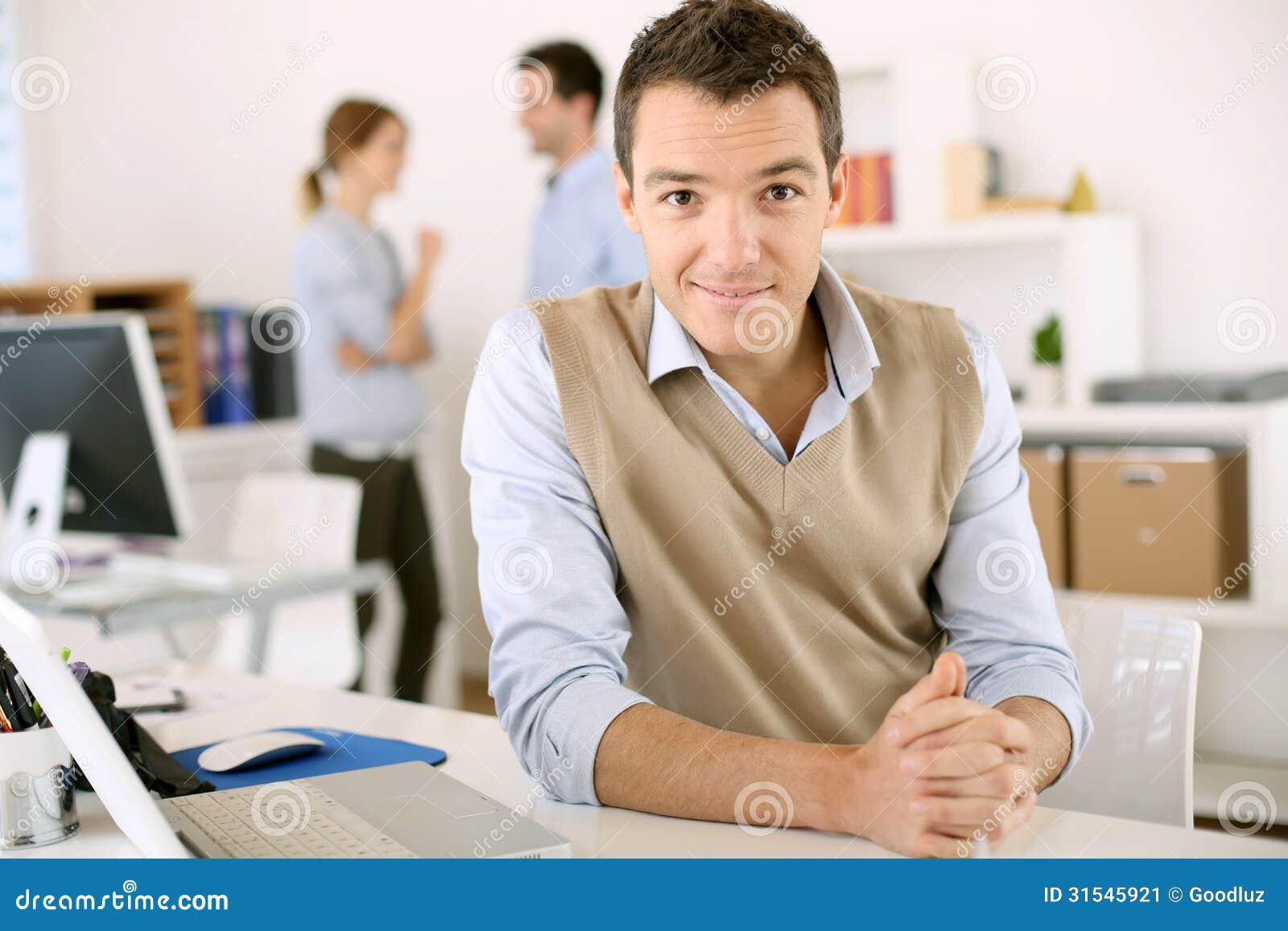 Satisfied and Friendly Man in Office Stock Image - Image of employee ...