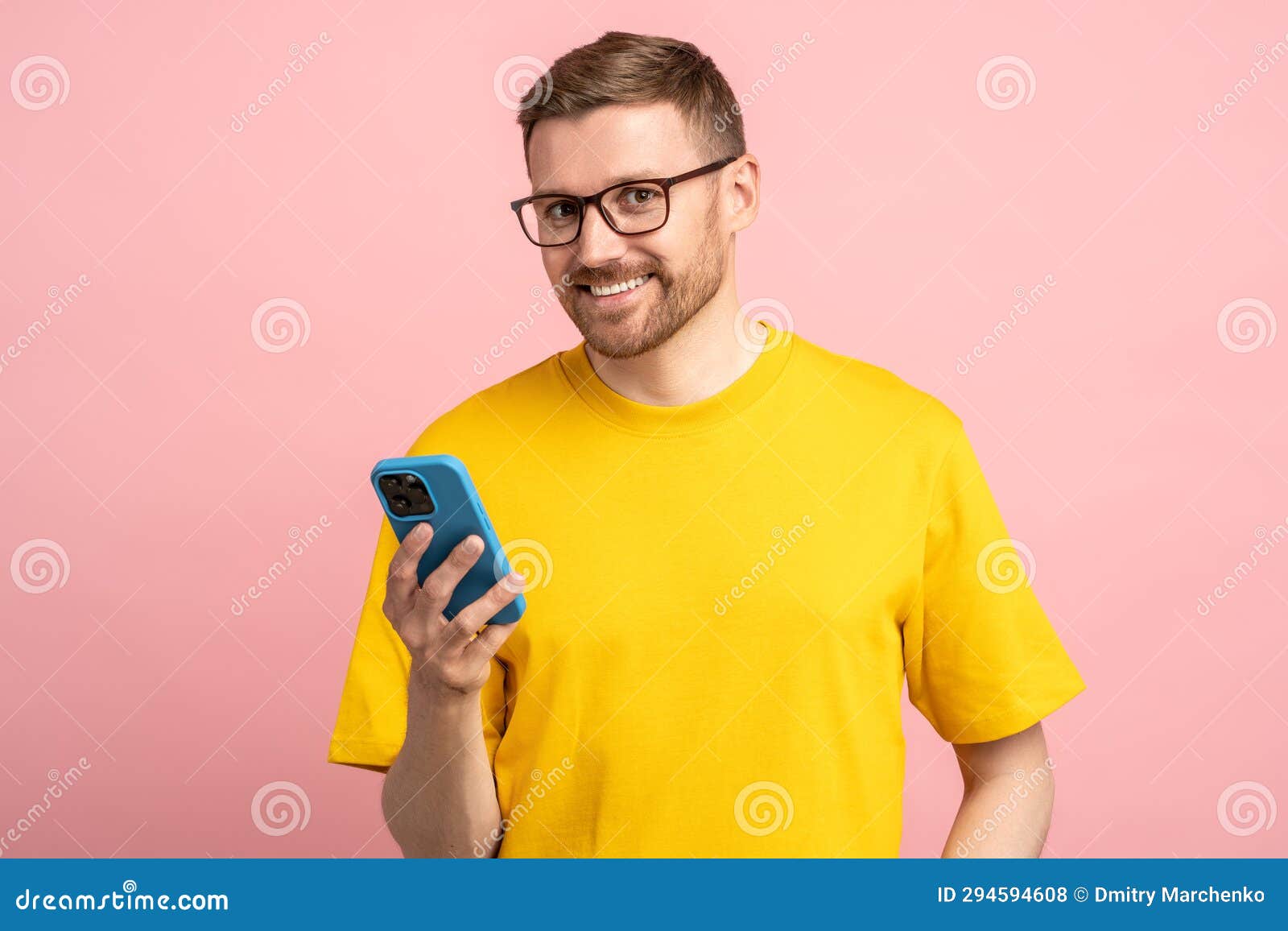 Satisfied With Good News Smiling Bearded Man In Glasses Looking At