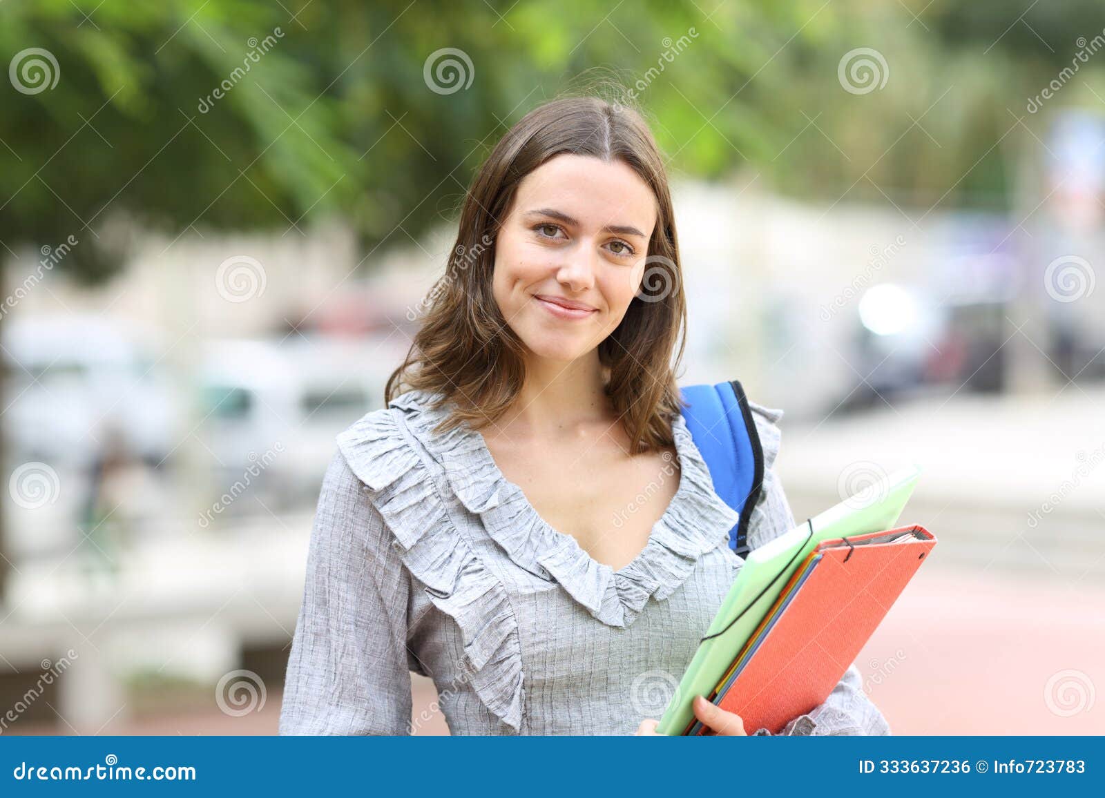 Satisfied Student Posing Looking at Camera in the Street Stock Photo ...