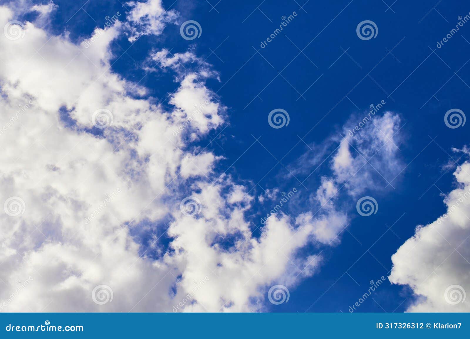 Saturated Blue Sky with Partial Clound Coverage for Backgrounds and ...