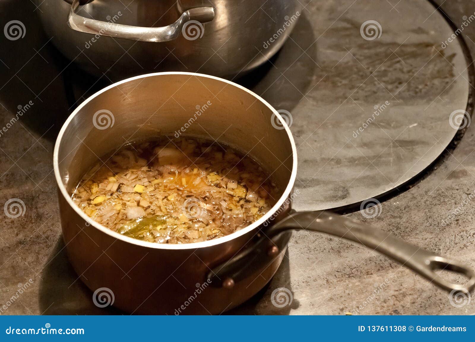 Sauce pans on range stock photo. Image of bouillon, poultry - 137611308