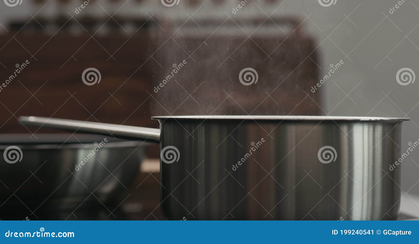Saucepan With Boiling Water On The Electric Kitchen Stove. Eggplant ...