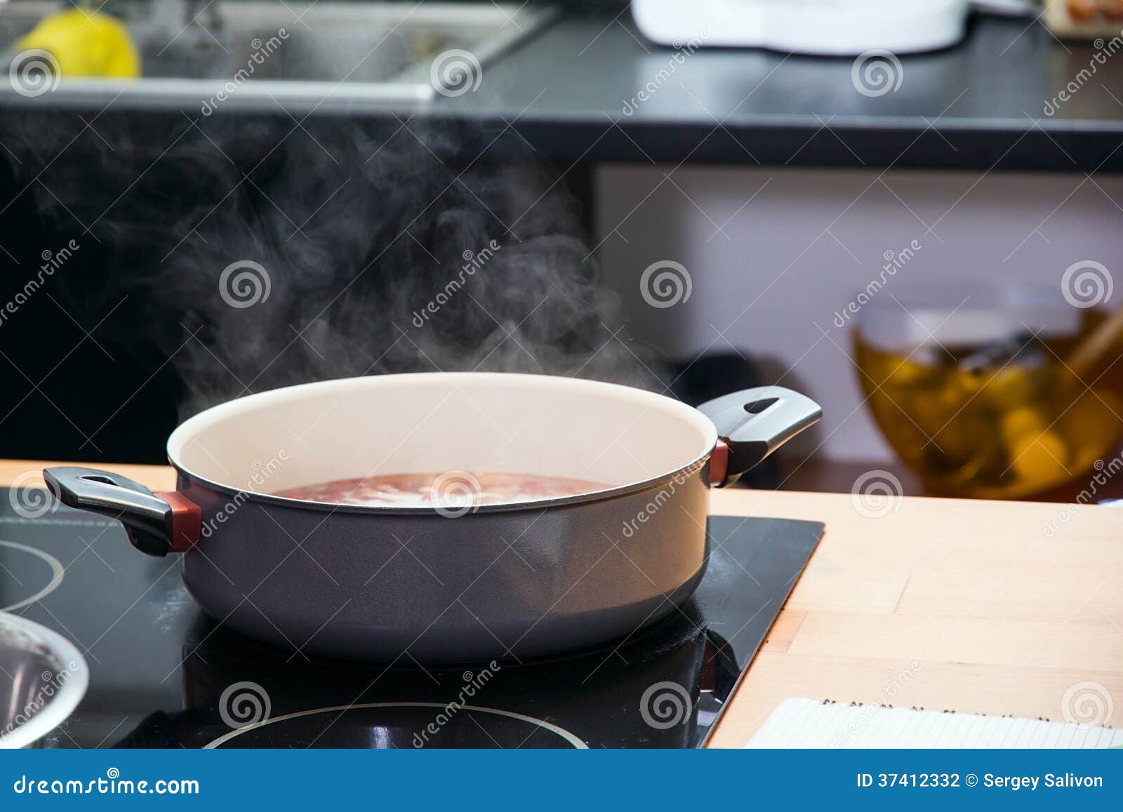 Saucepan on the plate stock photo. Image of kitchen, boiled - 37412332