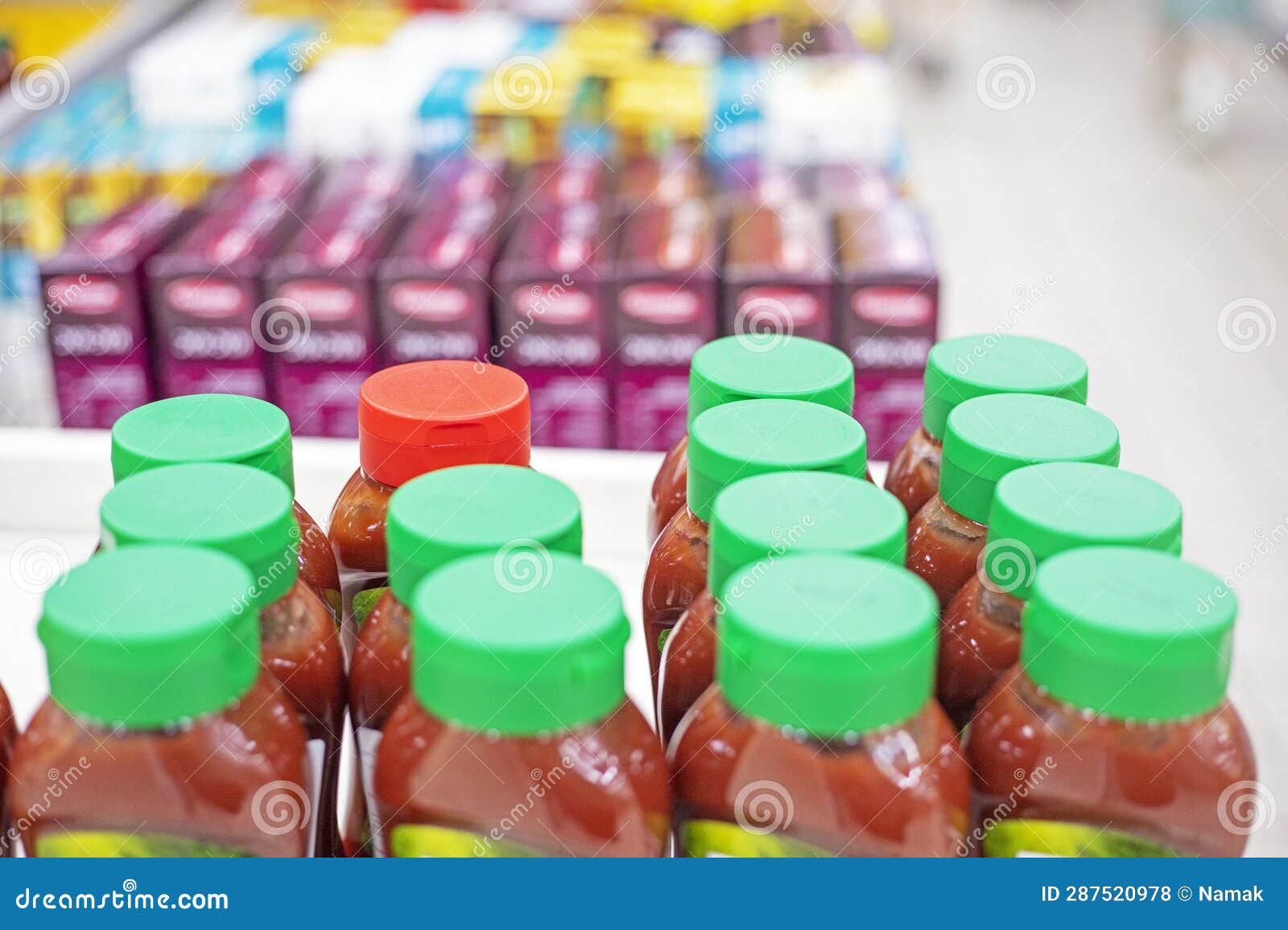 Sauces and Condiments Wrapped in Plastic Lids in a Supermarket. Stock ...