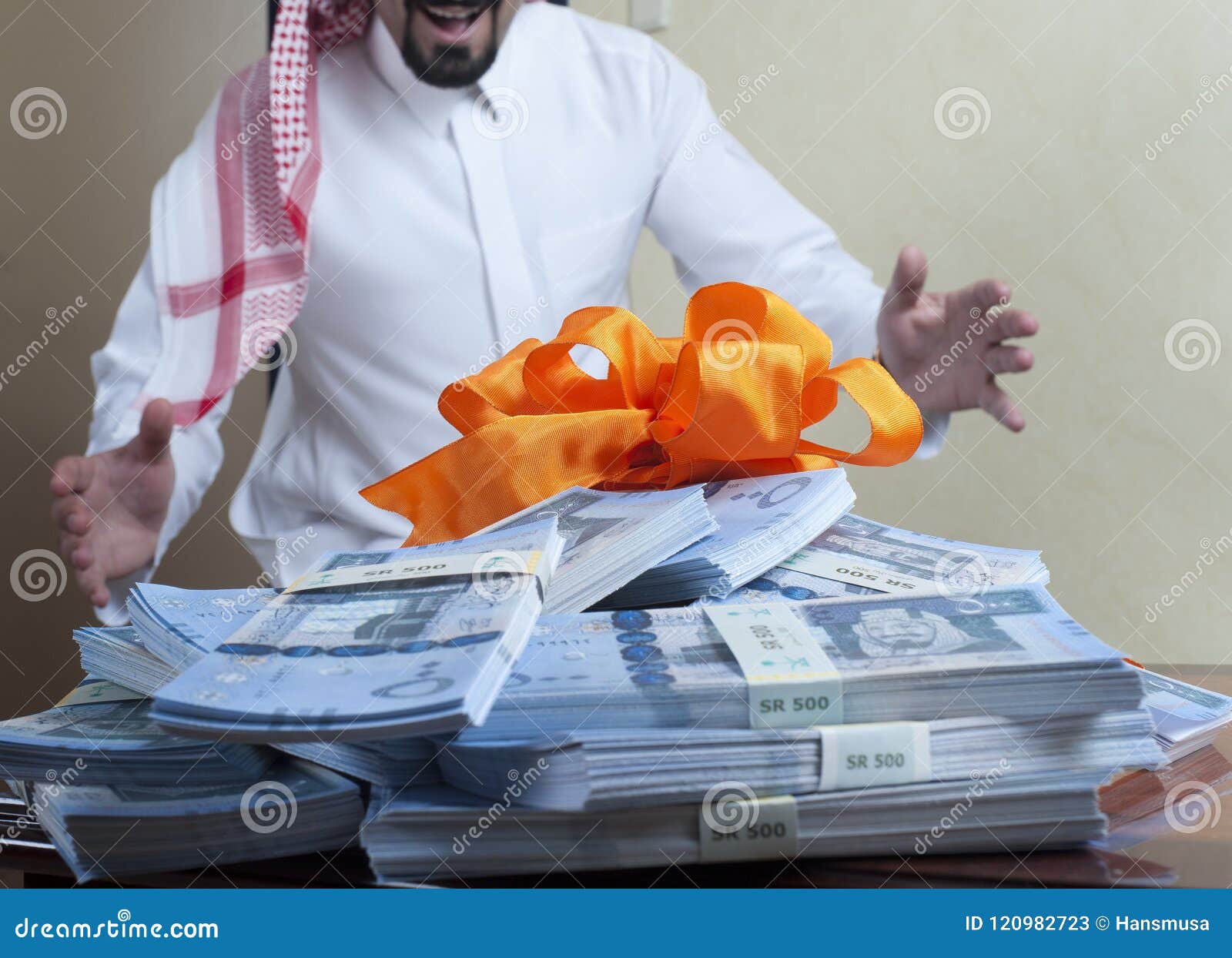 Saudi Arab Man Surprized With Stacks Of Money On The Table Stock Image ...