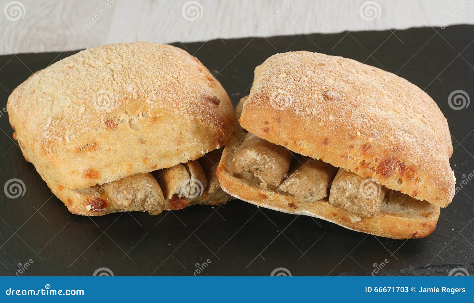 Sausage on bread cobs stock image. Image of delicious - 66671703