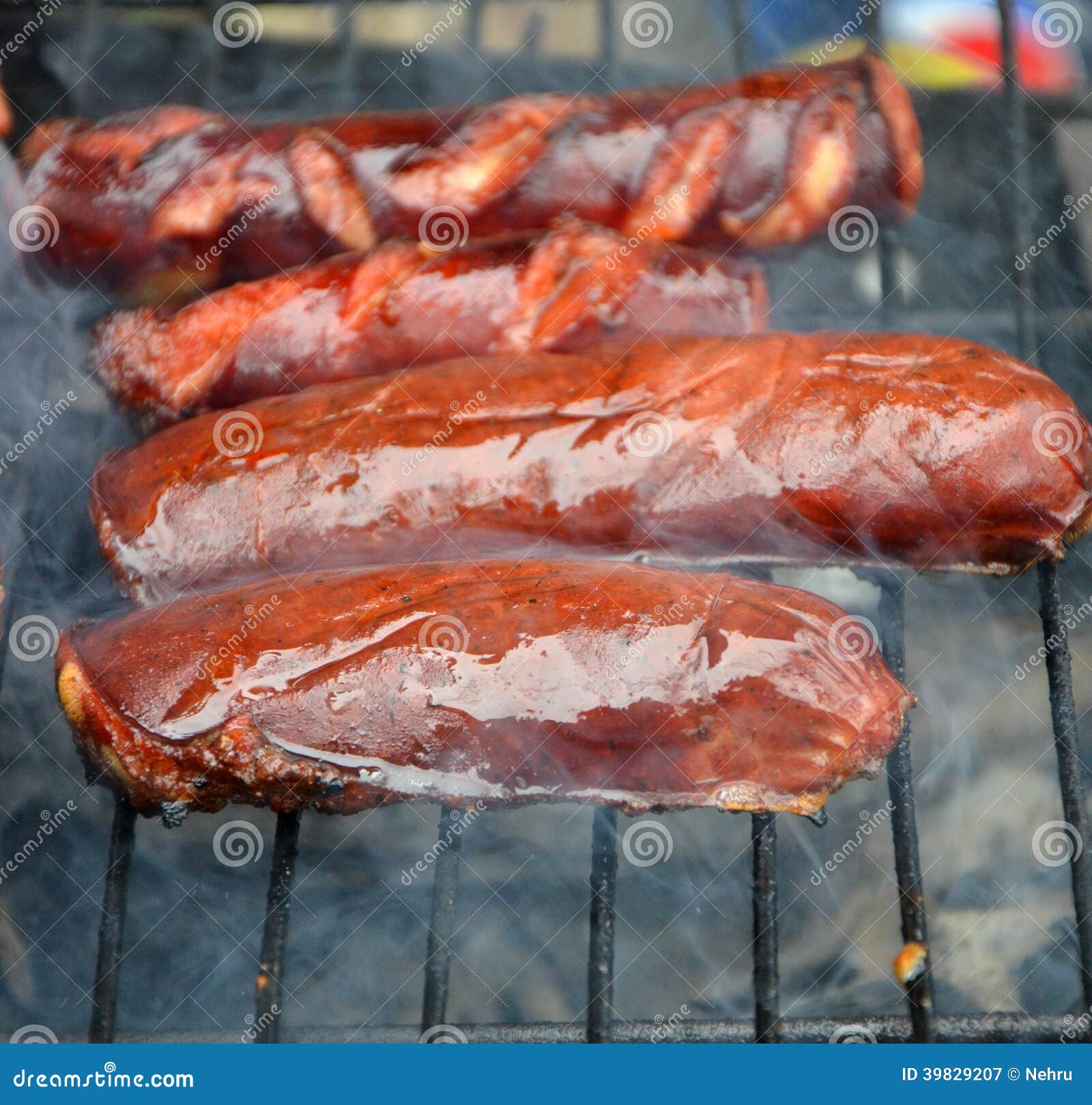 Sausage on a grill stock image. Image of fire, cook, german - 39829207