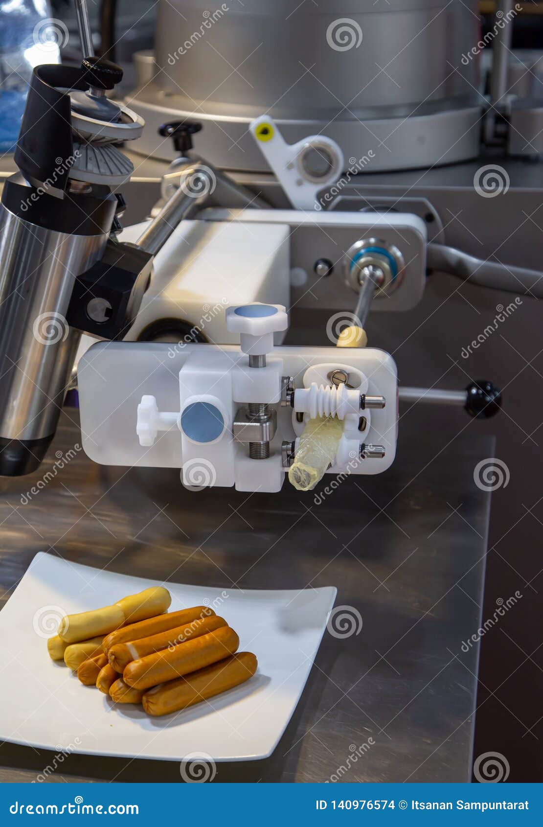 Sausage stuffing machine stock photo. Image of food - 140976574