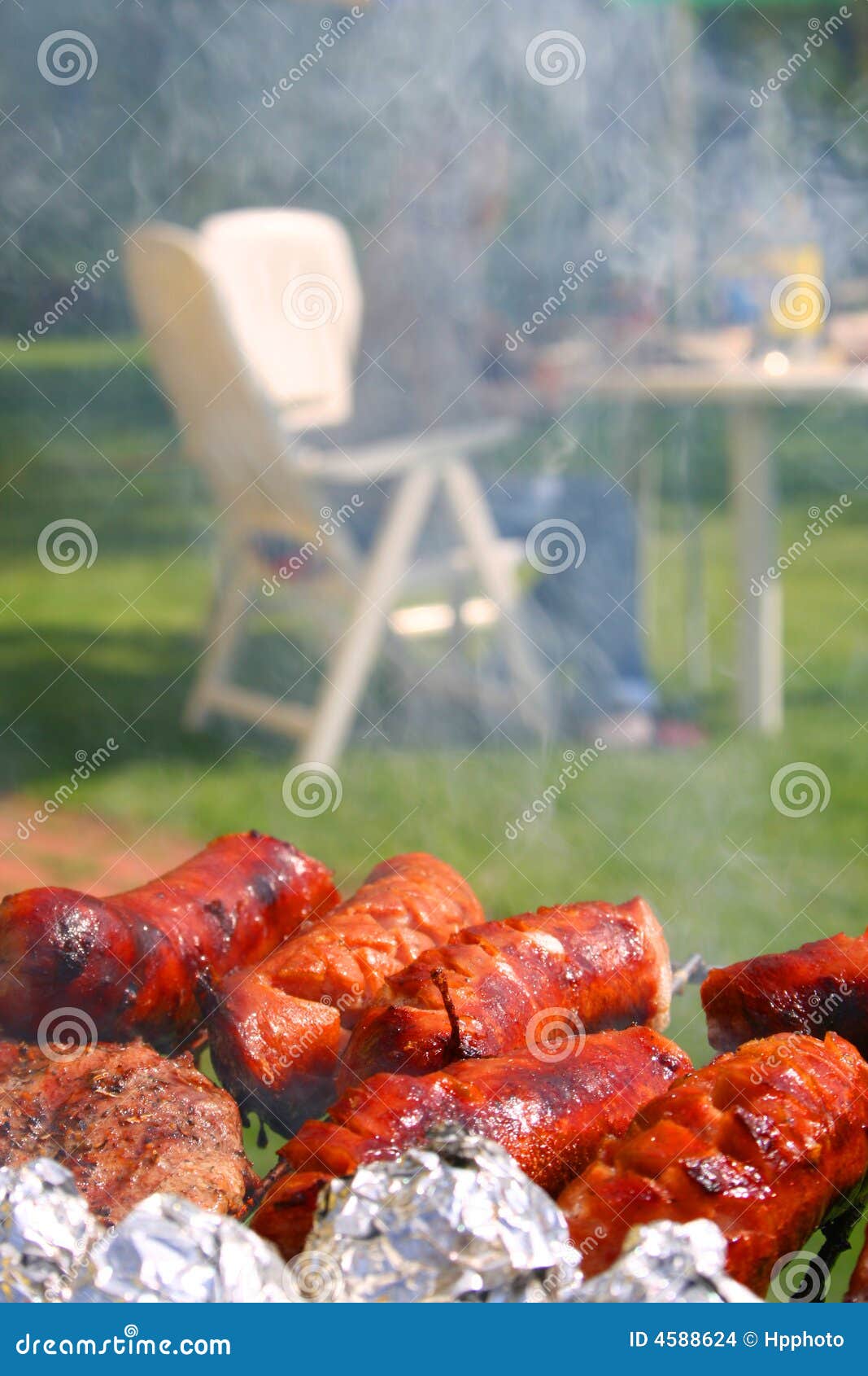 Sausages on a barbecue stock photo. Image of cooked, cooking - 4588624