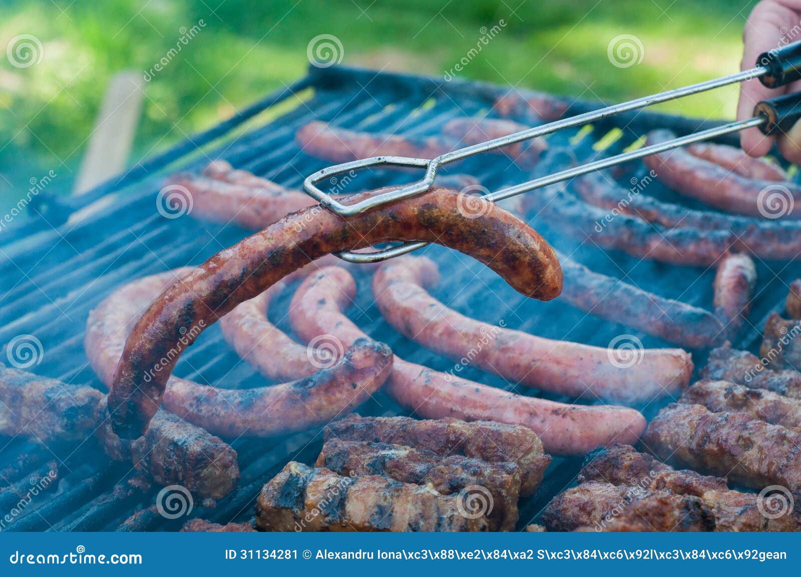 Sausages being grilled stock image. Image of countryside - 31134281