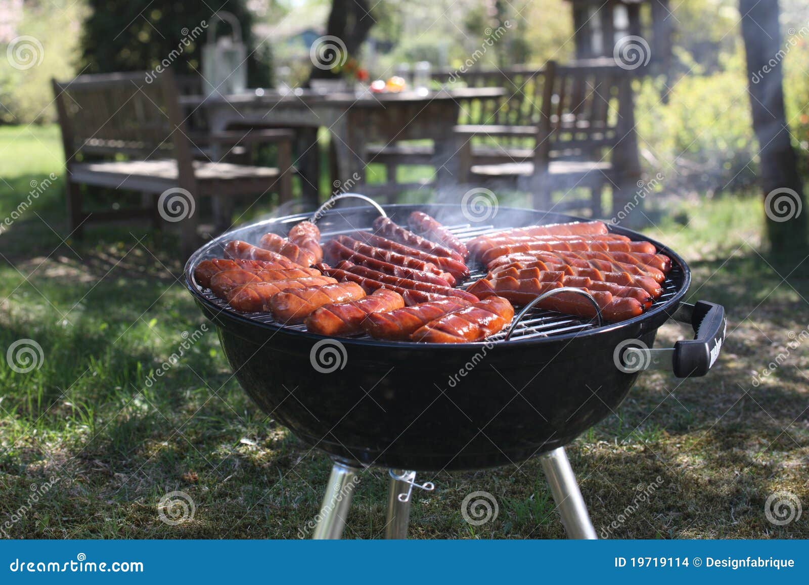 Sausages frying on a grill stock photo. Image of delicious - 19719114